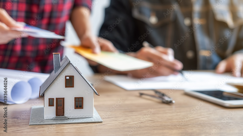 Interior designer and Architect choosing color in color swatch samples ...