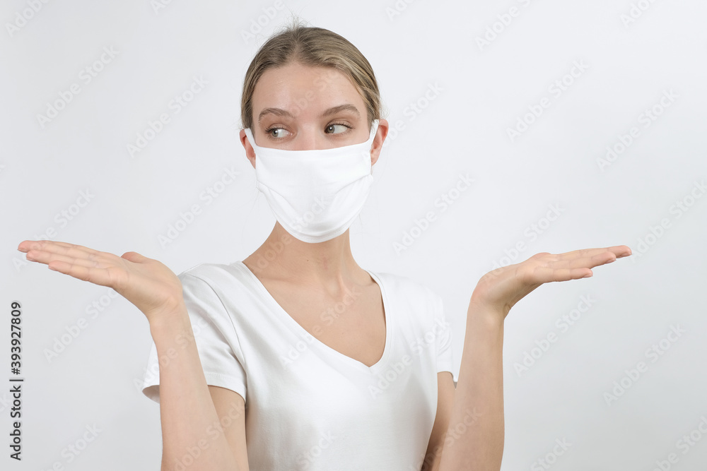 confused young girl shrugging shoulders, making helpless gesture with ...