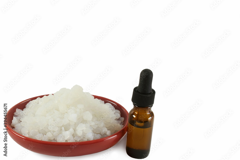 camphor or cinnamomum camphora crystal with camphor oil bottle in white ...