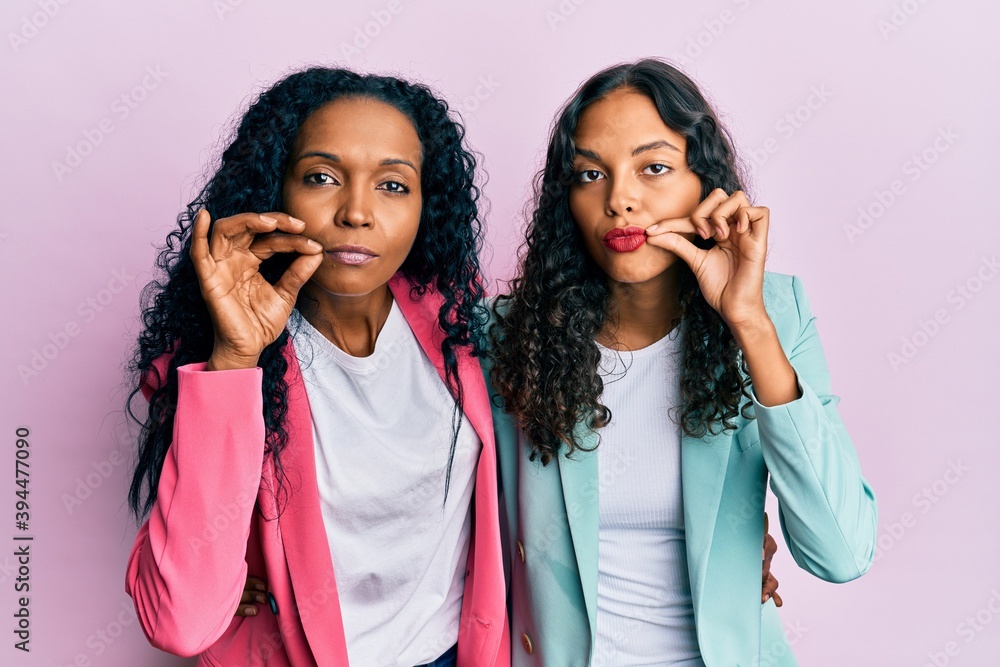 African american mother and daughter wearing business style mouth and ...