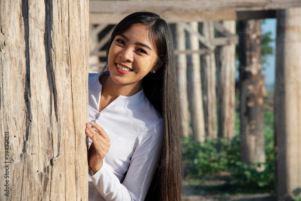 Beautiful women in Mandalay, Myanmar. Traditional dressing. Apply ...