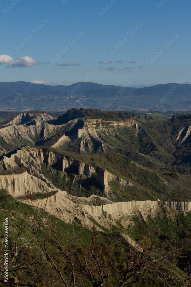 Remote view of the valley of the badlands, formed by landslides and by ...