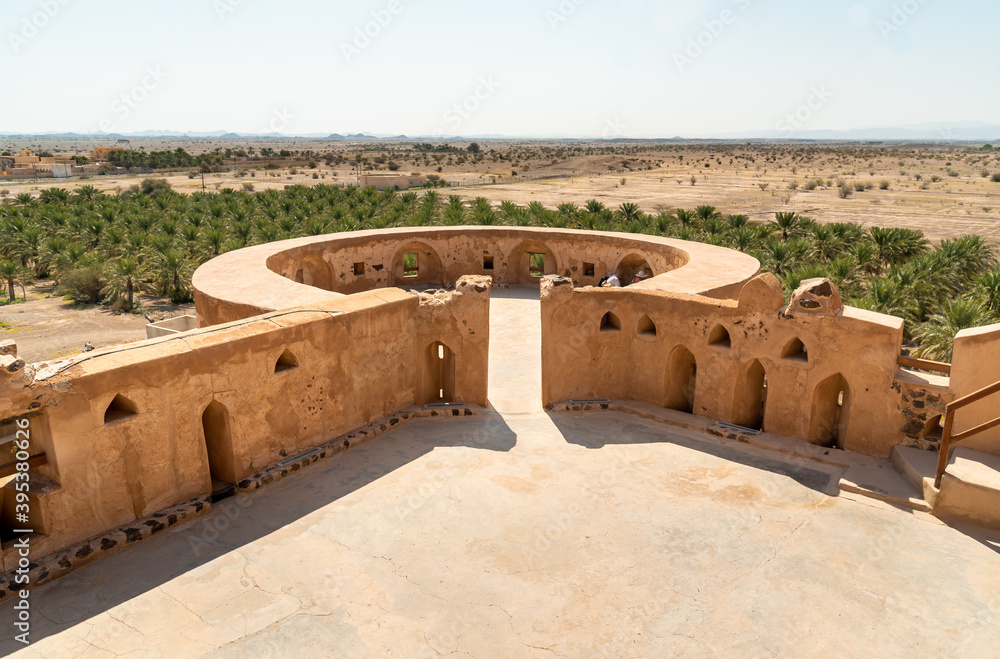 Terrace of the Jabreen Castle with the fields of date palms in ...