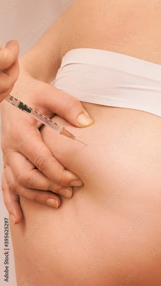 female butt injection. Self ass syringe. Taking body injecting. Woman ...