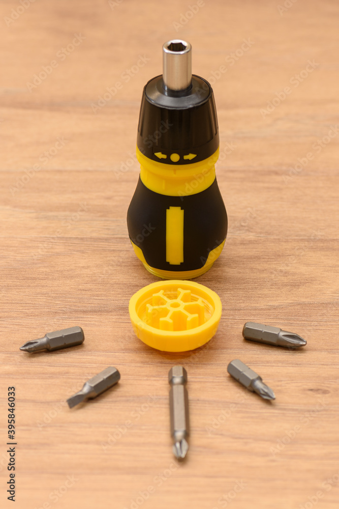 Still life photography of yellow-black screwdriver. Detailed macro ...
