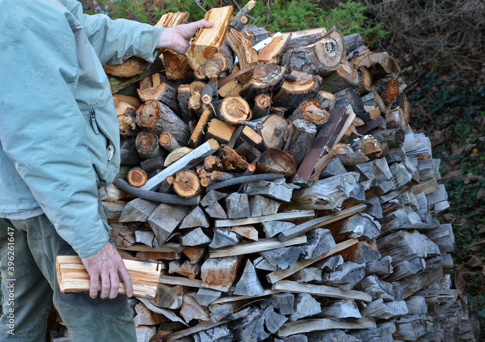 straightening chopped wood into a lump. folding into the shape of a ...