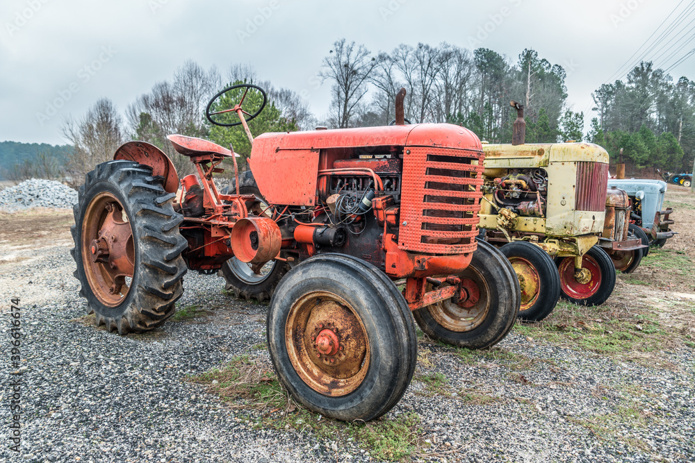 Row of antique tractors Stock Photo | Adobe Stock