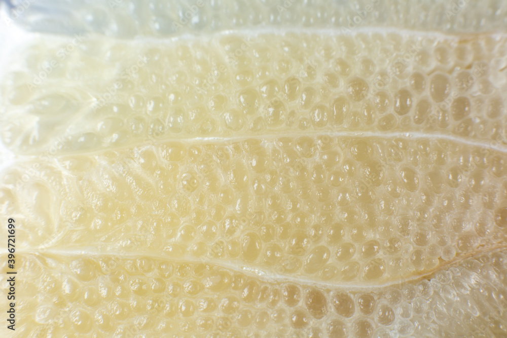 Grapefruit texture inside on the white background. Citrus close up ...