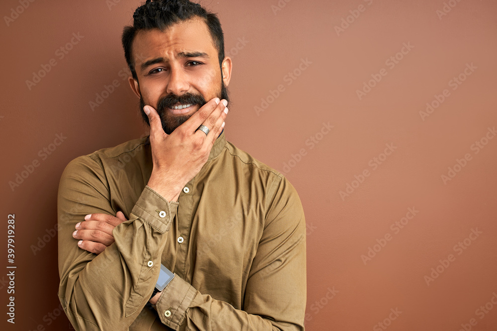 sad arabic man holding face isolated, feeling bad, with disappointed ...