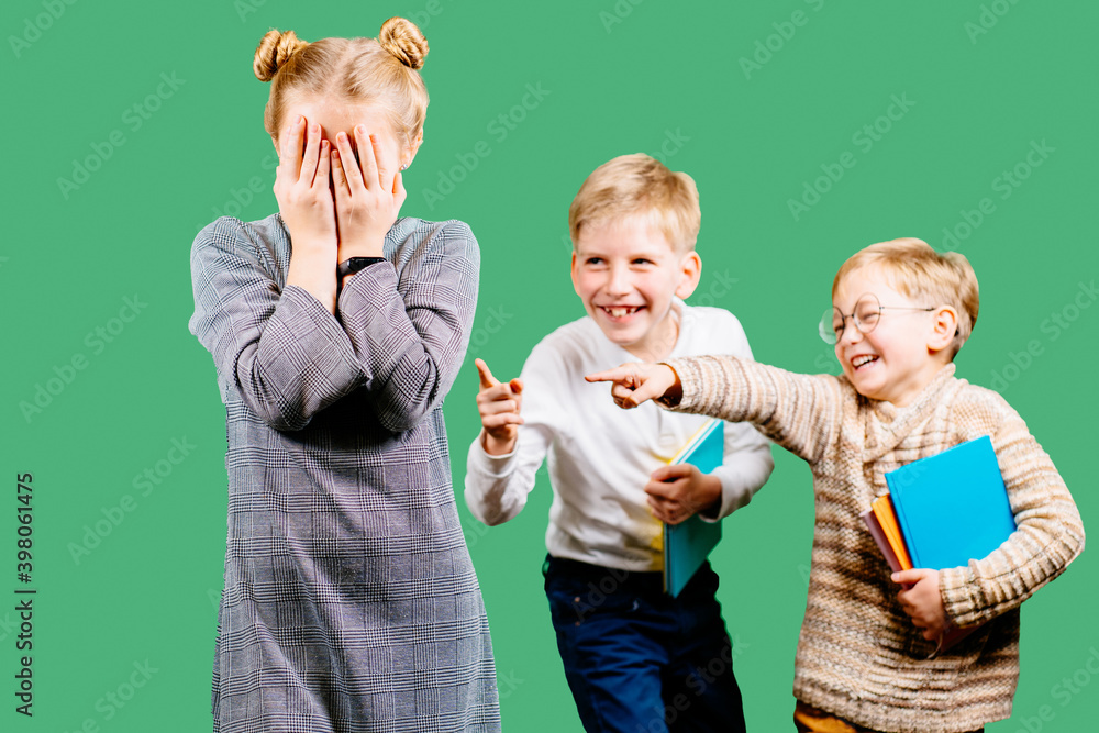 Children two boys bullying poor girl, sneering, offending her at ...