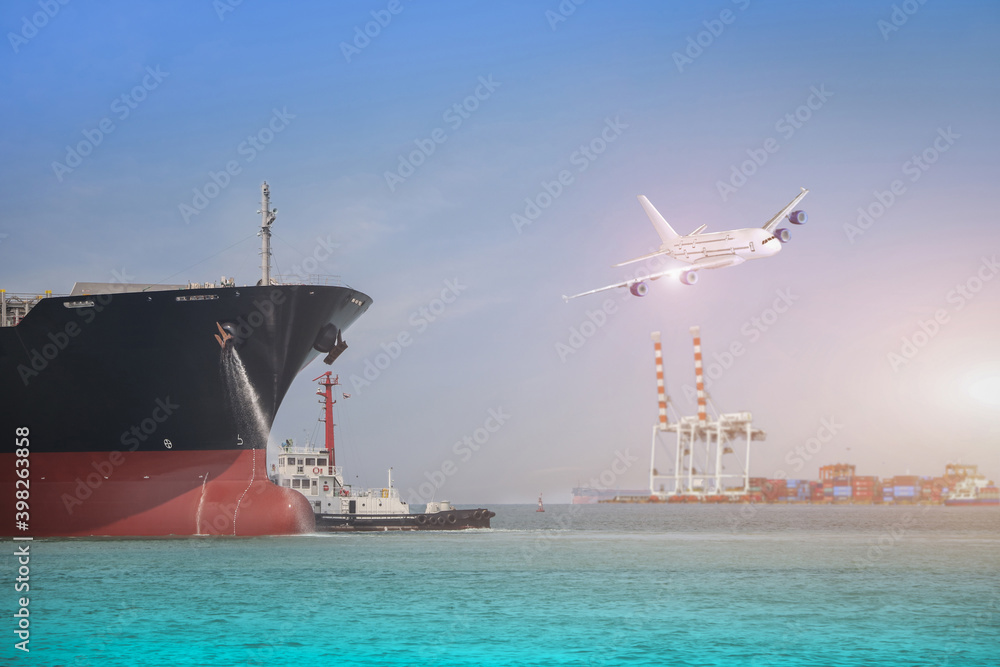 Cargo ship sailing in the sea by tugboat assistance, Logistics and ...