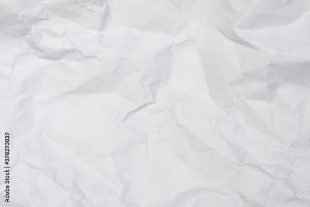 Fotografie White crumpled paper texture background. White wrinkled ...