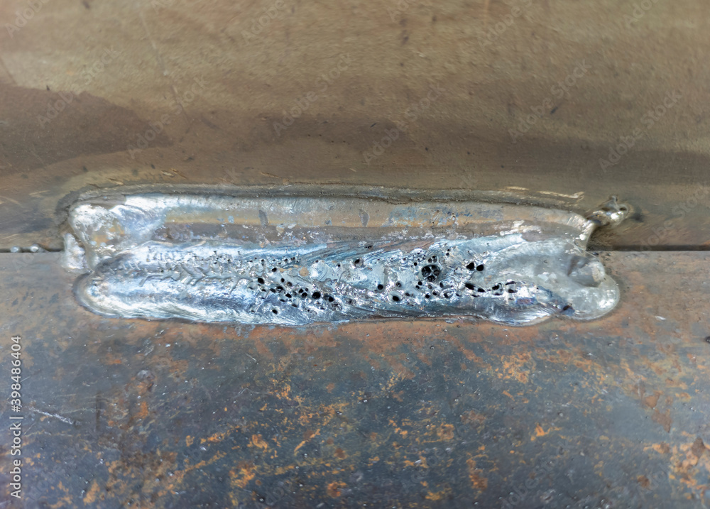 Porosity or worm hole in weld, Defect of welding process Flux Cored Arc ...
