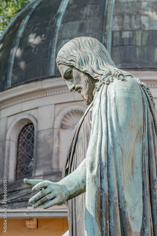 Old statue of Jesus Christ with open arms at the ancient church called ...
