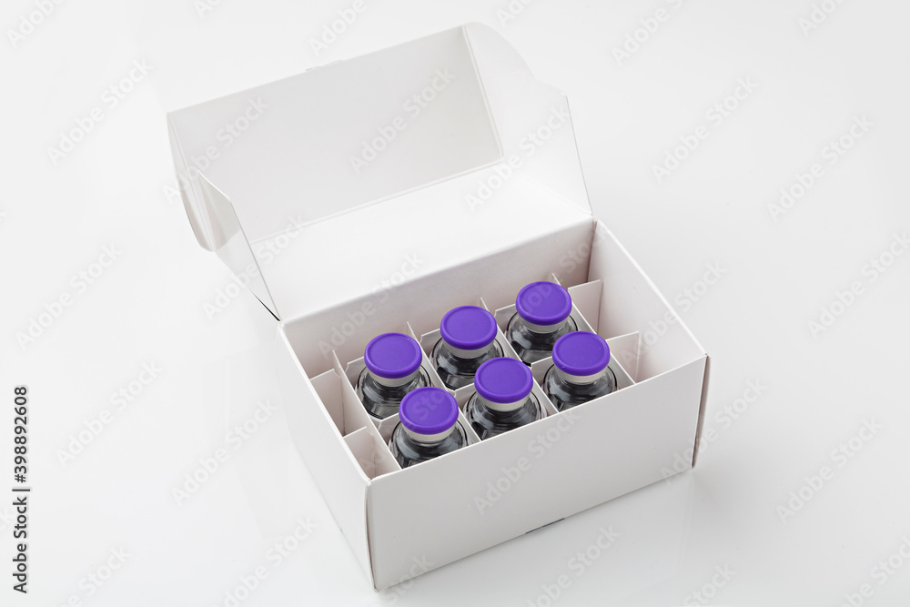 Box with Covid19 vaccines on white background, ready for vaccination ...