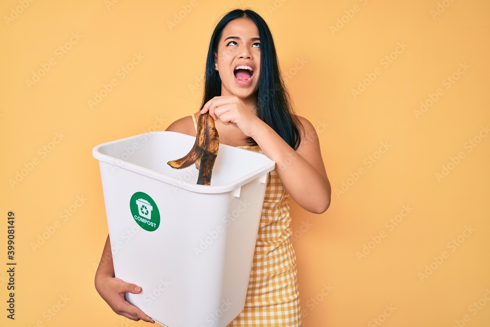 Young asian girl recycling food composting organic fertilizer angry and ...