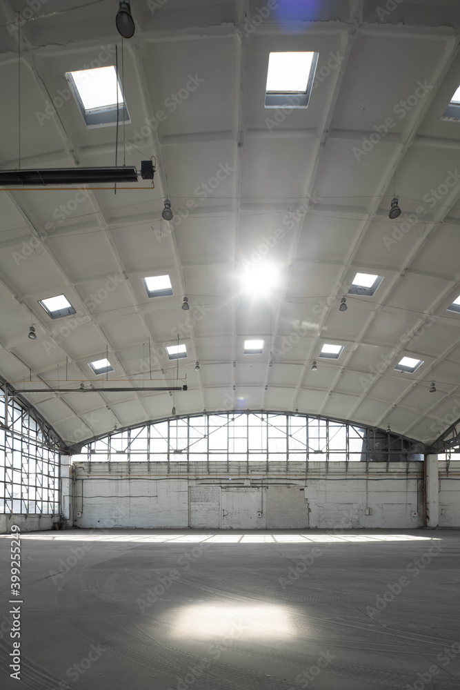 Huge empty industrial warehouse building. White interior. Hemispherical ...