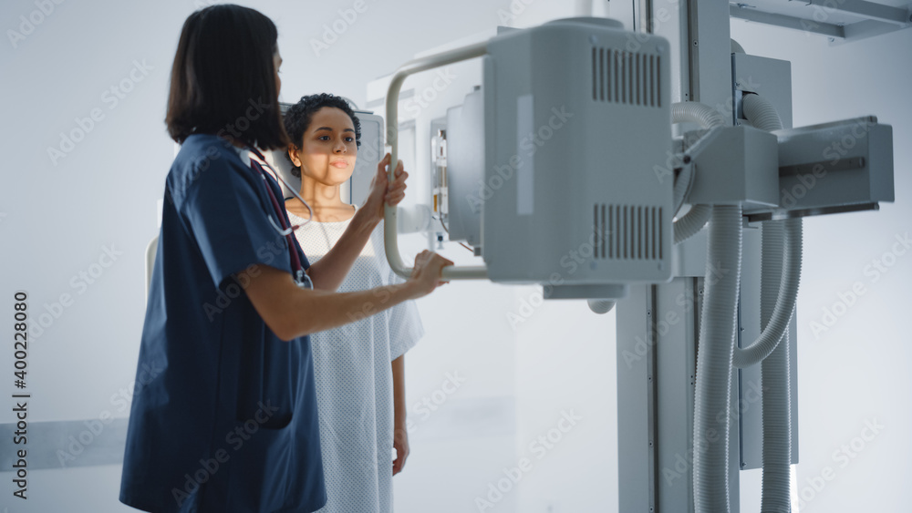 Hospital Radiology Room: Beautiful Latin Woman Standing while Female ...