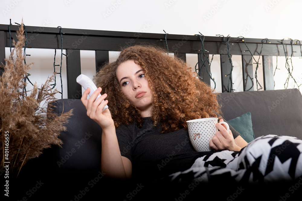 Sick woman lying in bed in self isolation at coronavirus covid-19 ...