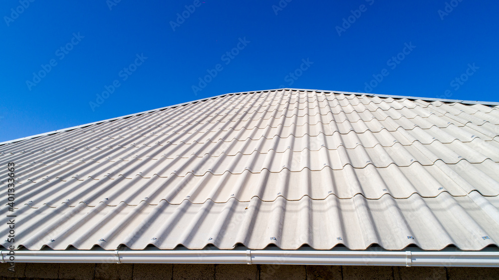 Modern roof. Roof covering. Roman profile. The roof of the house is ...