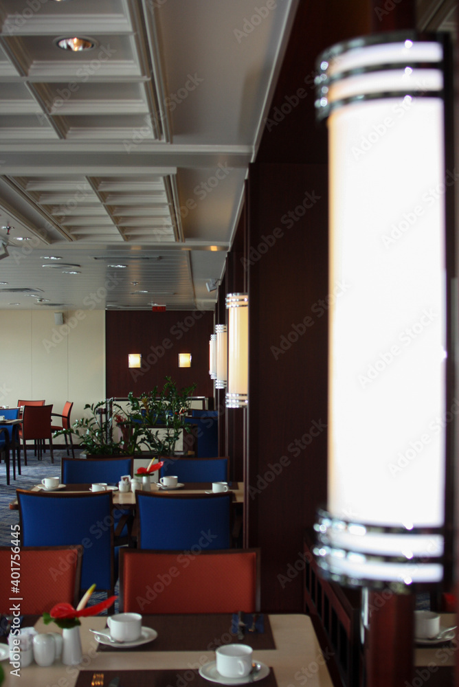 Elegant and formal dining room or restaurant onboard luxury cruiseship ...