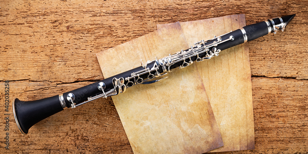 black wooden clarinet silver woodwind musical brass instrument with old ...