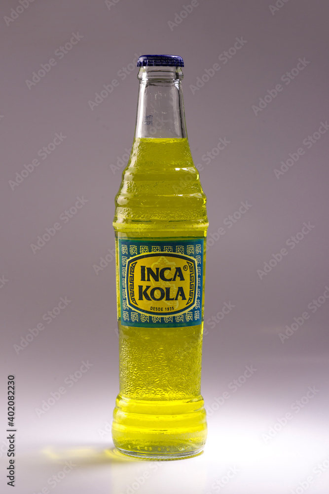 Foto de Stock LIMA, PERU - CIRCA 2019: A classic glass bottle of Inca ...