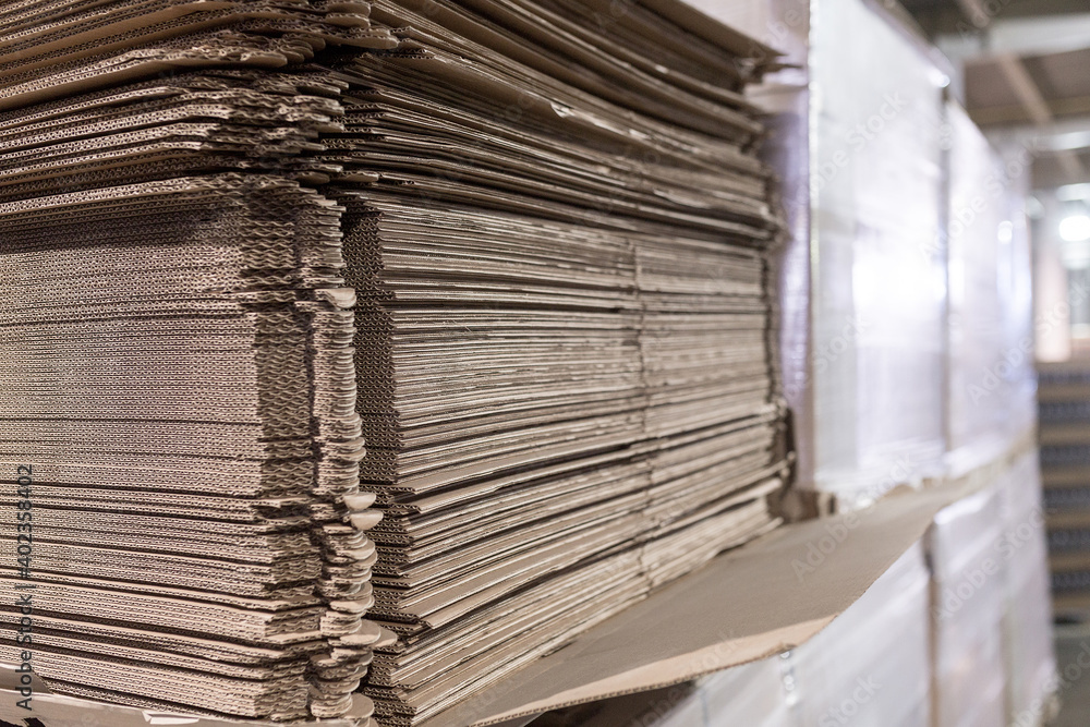 Perforated sheets of corrugated cardboard by stack on pallets - after ...
