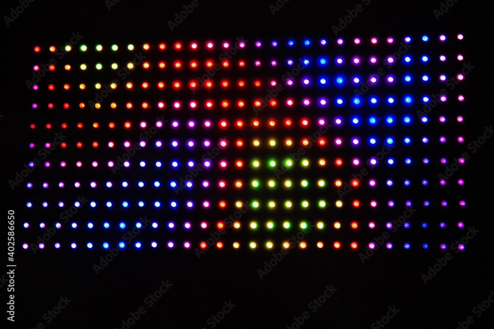Colourful RGB LED lights on black background. LED Matrix with WS2812B strips. Playing animations ...