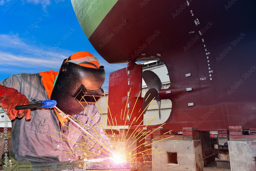 Industry Shipyard Welding arc worker with spark weld factory at ...