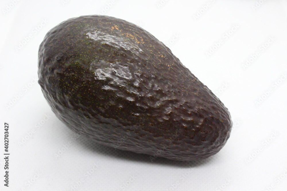 Foto de Stock Avocado, Hass variety - a large fruit with a dark purple ...
