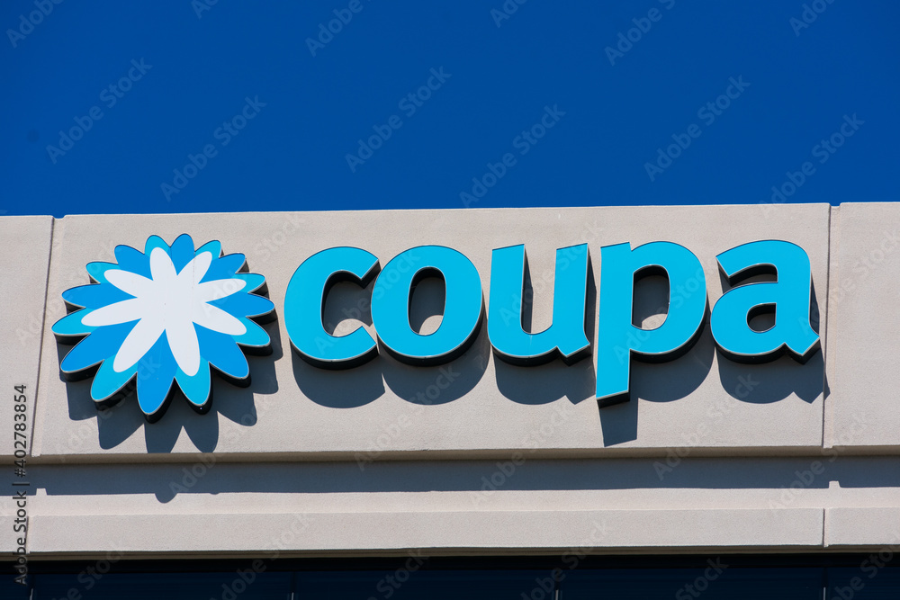 Coupa logo and sign atop of headquarters of Coupa Software company ...