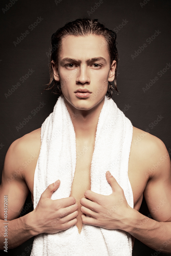 Strong stripped muscle male model in white underwear on black isolated ...