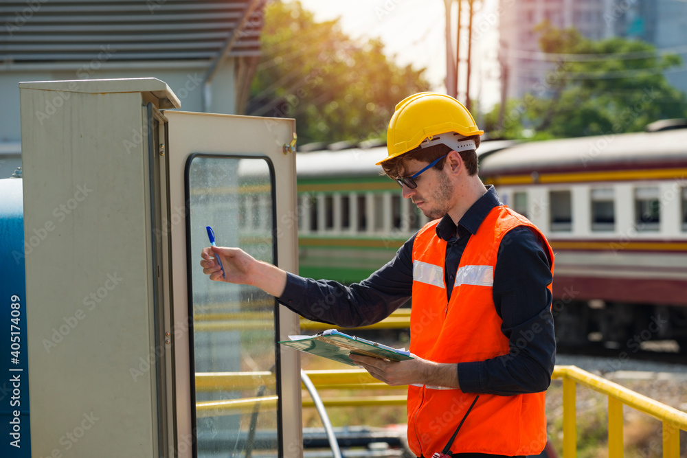 Worker checking and inspecting at MDB panel ,working with electric ...