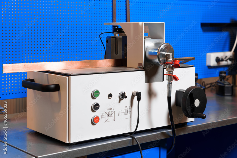 Work table with tools for making connections and crimping electrical ...