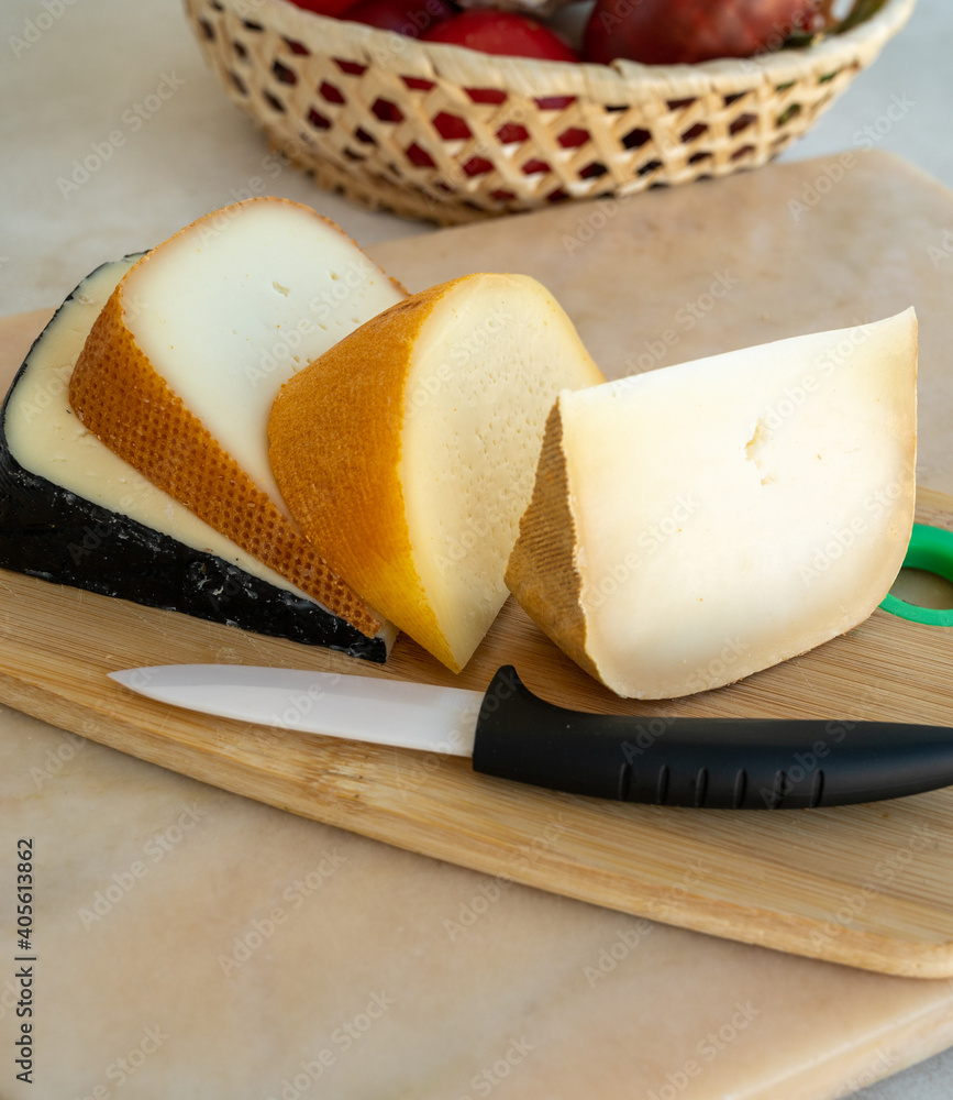 Cheese collection, French fol epi cheese with many little holes, etorki ...