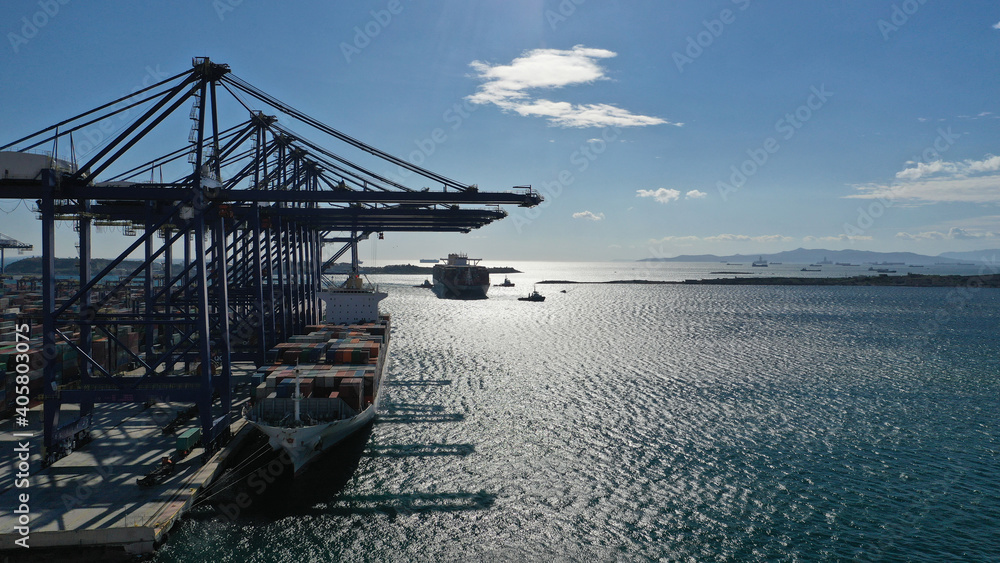 Aerial drone photo of container truck size cargo vessel approaching ...