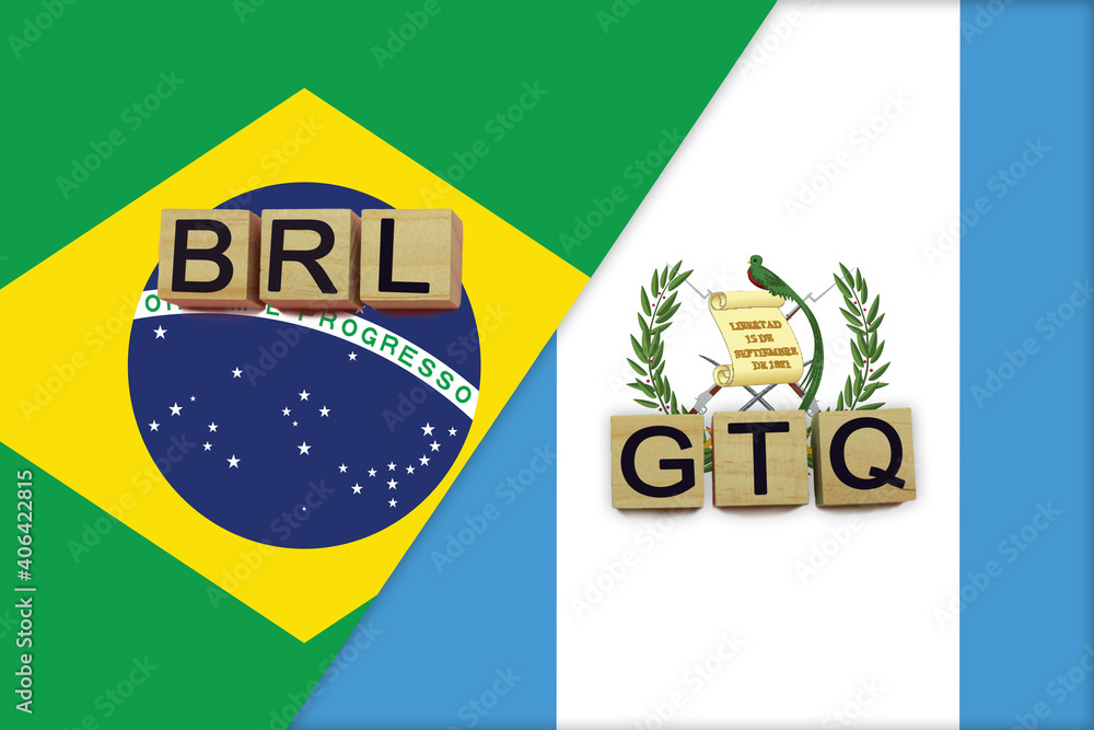 Brazil and Guatemala currencies codes on national flags background ...