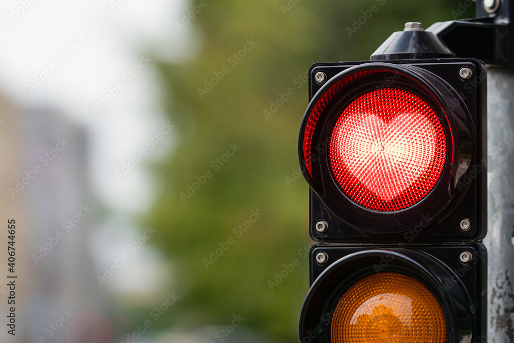 traffic control semaphore with red heart-shape in semaphore on a ...