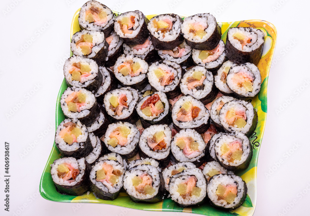Top view of stack of Japanese sushi maki roll plate. Served in Japanese ...