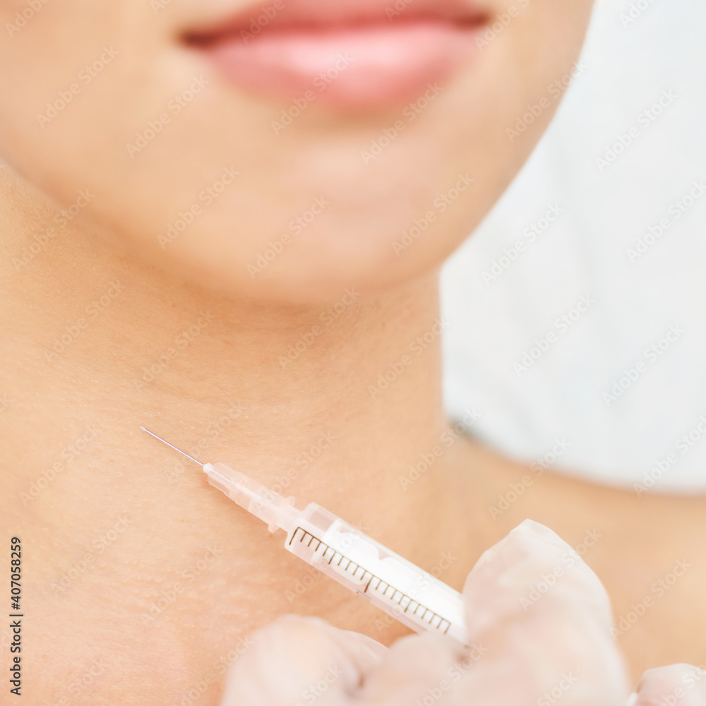 Neck injection at spa salon. Doctor hands. Closeup view. Pretty female ...