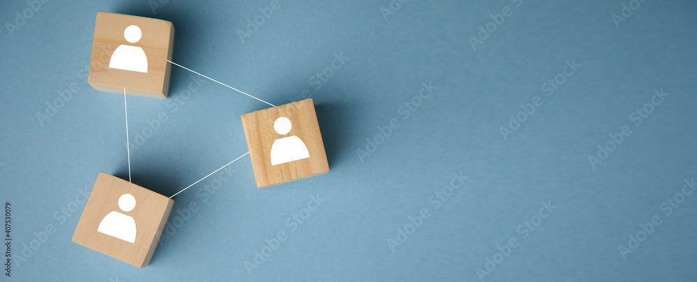 Wooden blocks connected on blue background Stock Photo | Adobe Stock