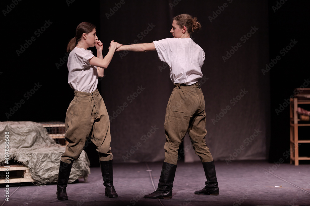 Actors in military uniforms of the Soviet army of World War II play a ...