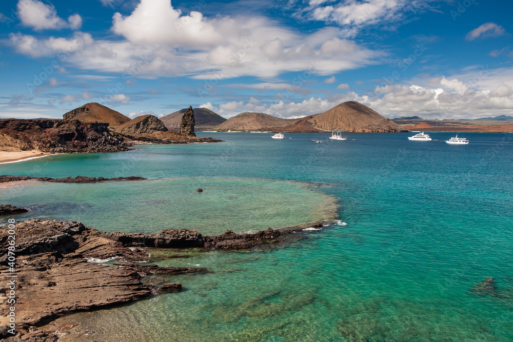 Galapagos islands. Ecuador. Volcanic Pinnacle Rock next to underwater ...