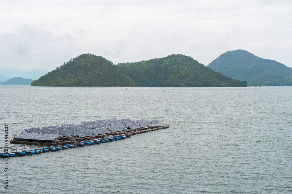 Floating solar panel on water at a dam in the morning. Produce ...