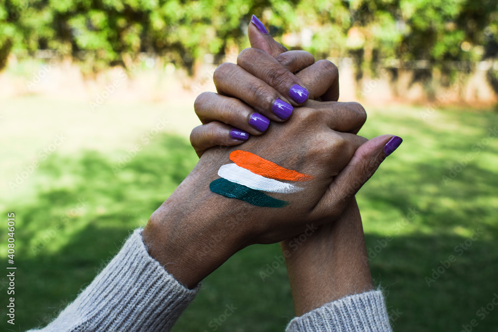 Indian flag tattoo of tri colour painted on person's hand cheering and ...