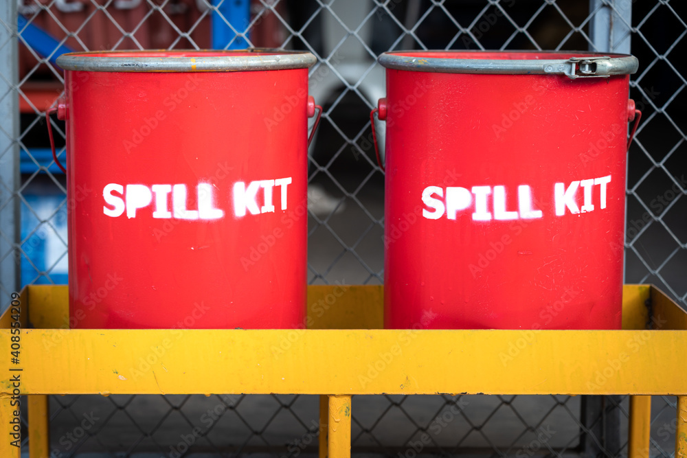Spill kit containment boxes are prepared and placed in front of the ...