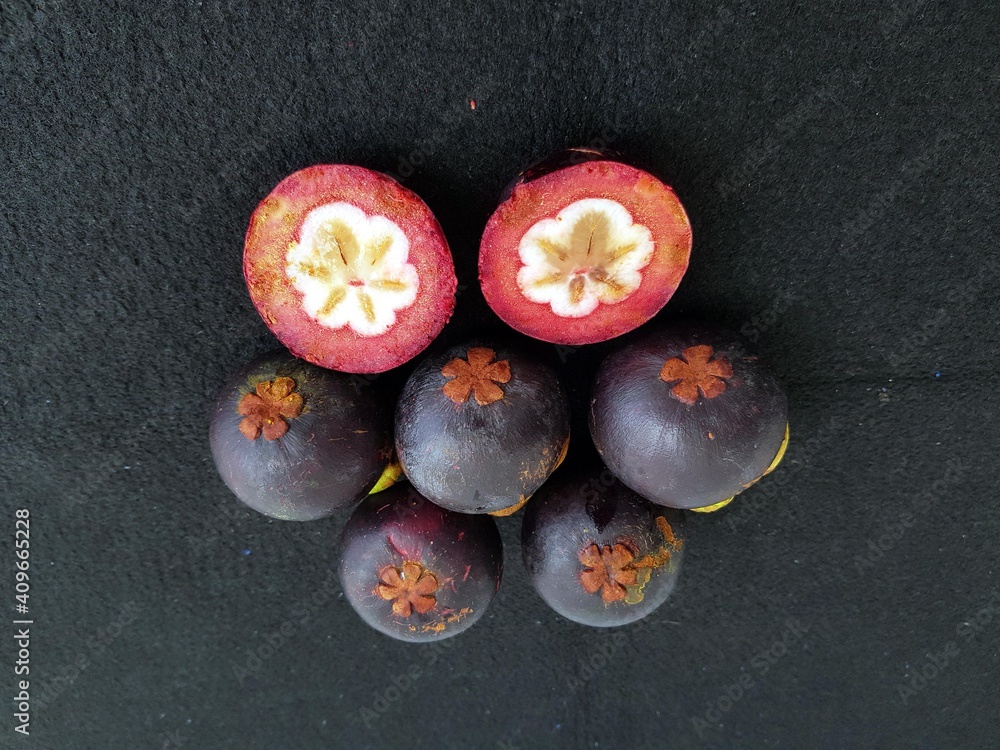 Mangosteen (Garcinia mangostana), also known as the purple mangosteen ...