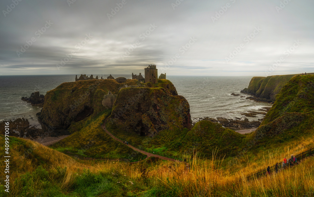 Breathtaking panoramic view of aged Dunnottar Castle located on rocky ...