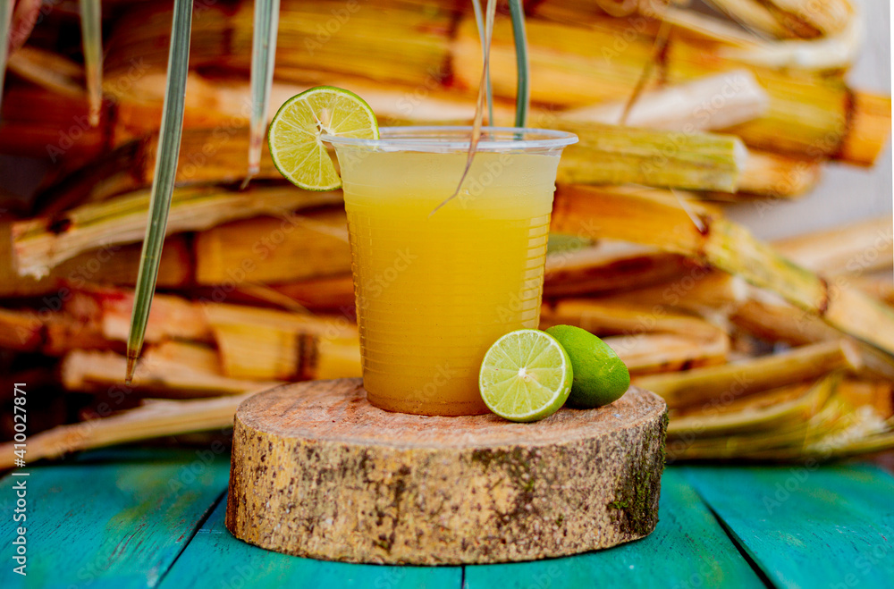 Sugarcane juice, guarapo de caña o jugo de caña de azucar. Stock Photo ... Sugarcane juice, guarapo de caña o jugo de caña de azucar. Stock Photo ...